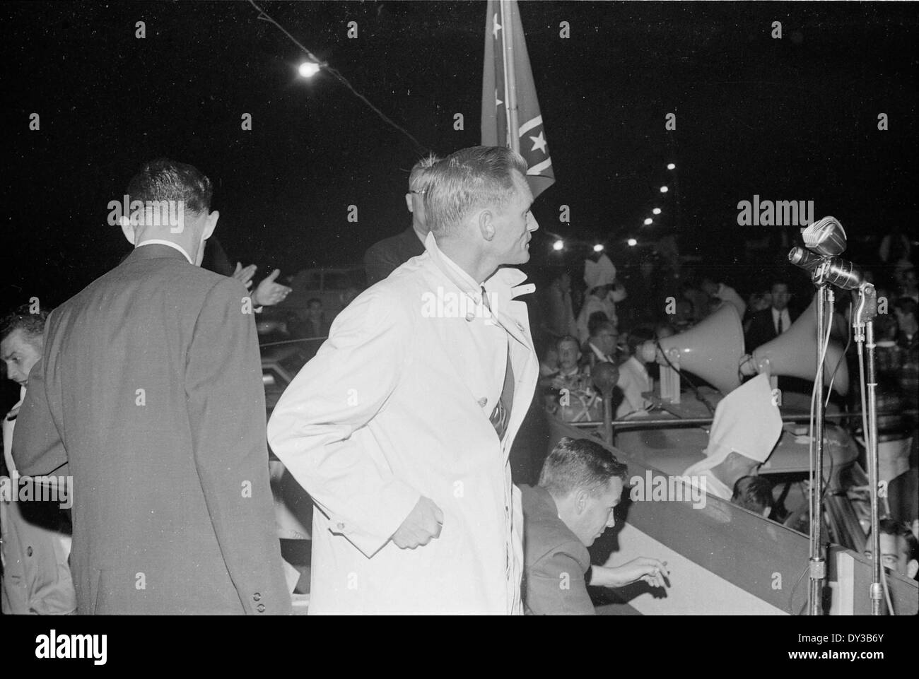 A historical photograph depicting a Ku Klux Klan rally in 1965 ...