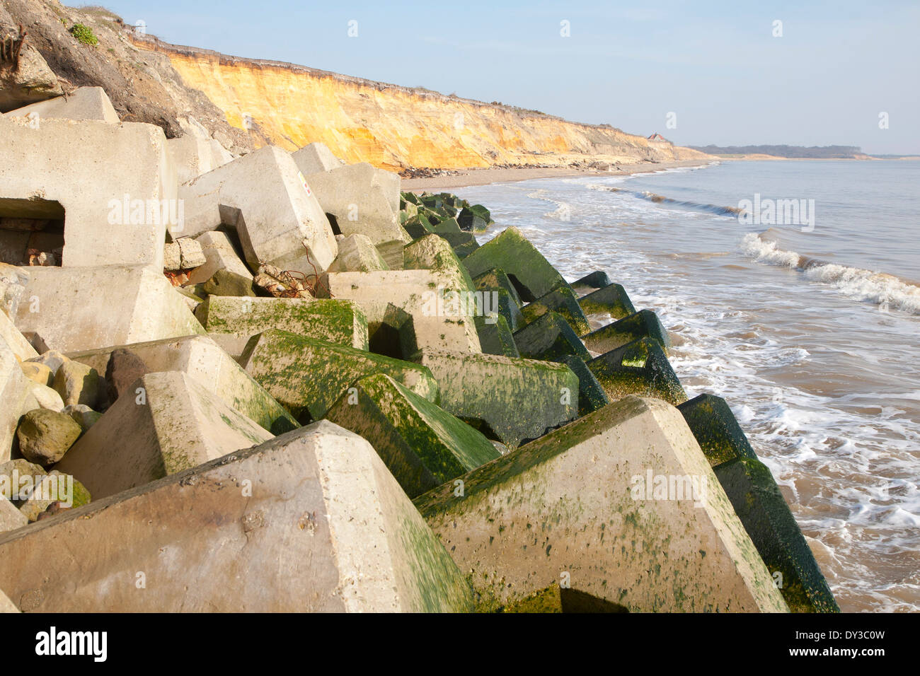 Concrete rectangular blocks protecting soft cliffs coastal defences at ...