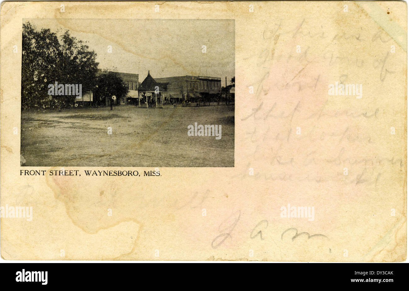 This postcard image shows Front Street in Waynesboro, Mississippi ...