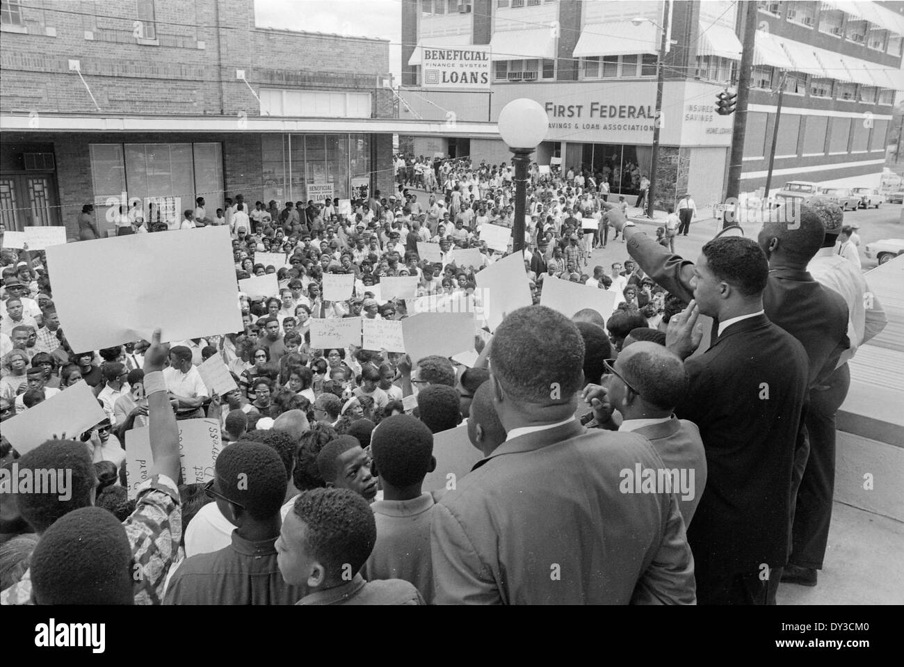 This photograph captures a march led by Dr. Martin Luther King Jr. on ...