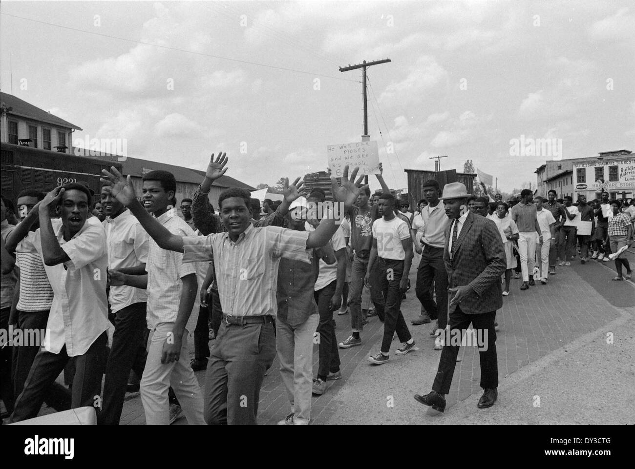 This image captures Dr. Martin Luther King Jr. leading a march in ...