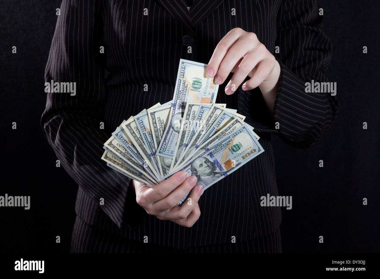 Take a banknote from cash Stock Photo - Alamy