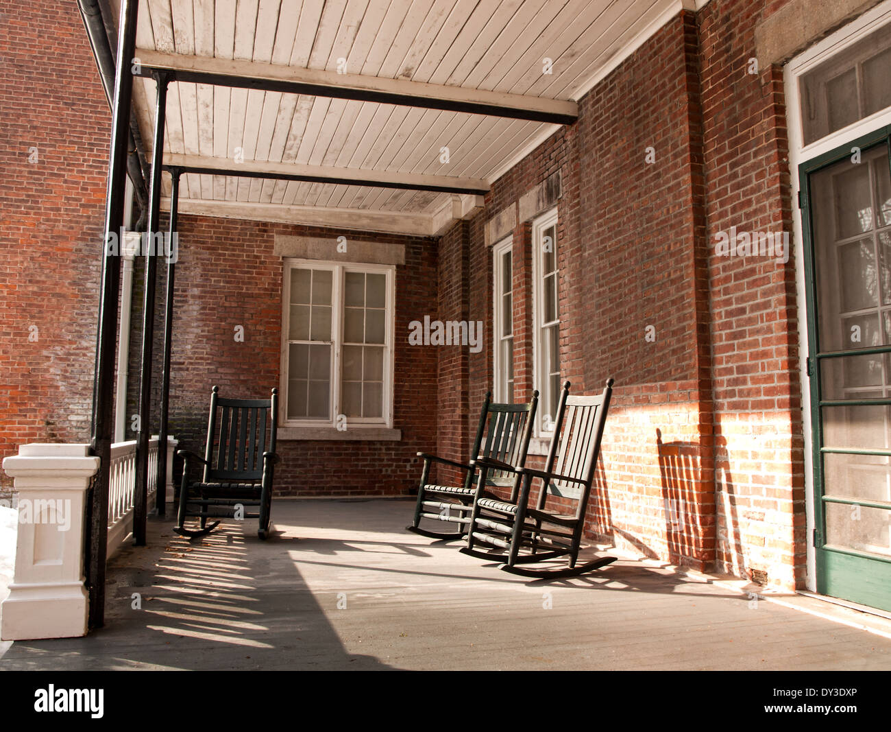 porch in the countryside with old rocking chairs Stock Photo - Alamy