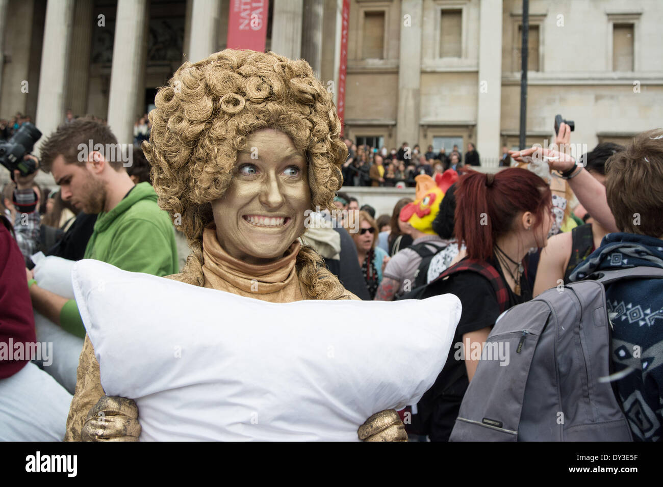 A gold painted "Human Statue" busker joins in with the fun on ...