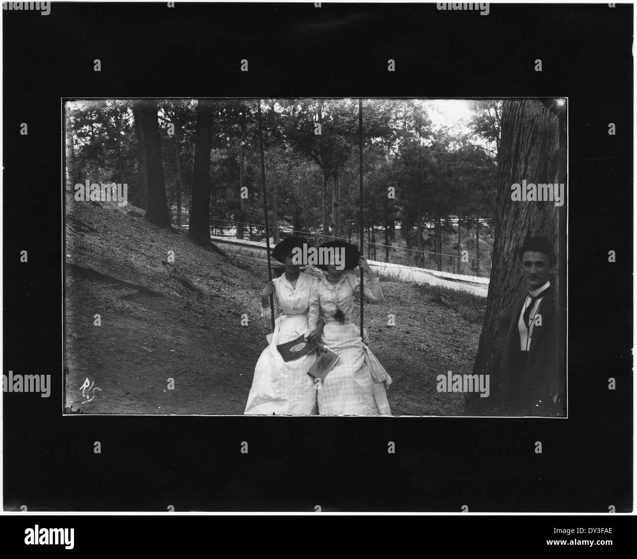 This photograph depicts an unidentified man and women from an ...