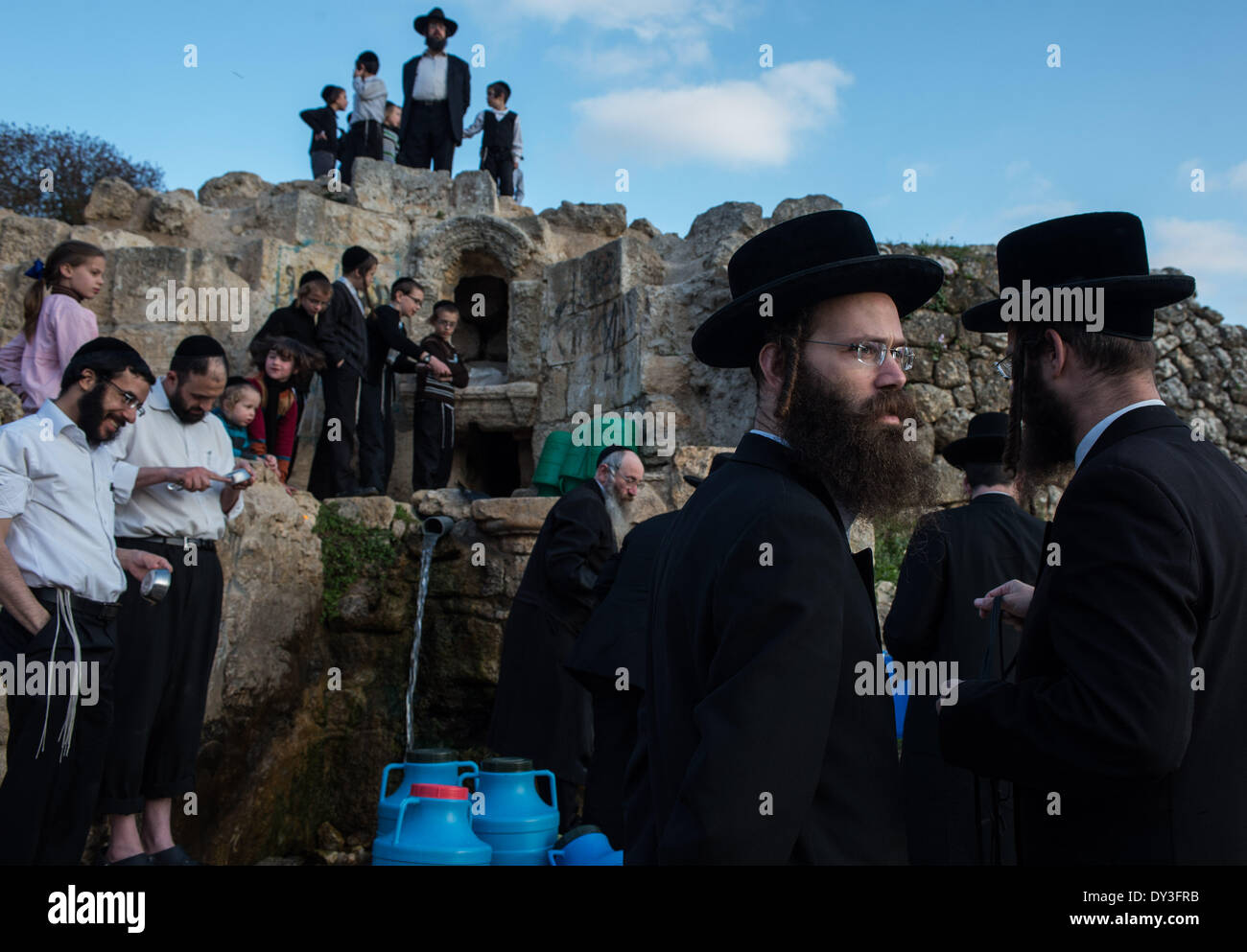 Jerusalem. 3rd Apr, 2014. Ultra-Orthodox Jews collect spring water ...