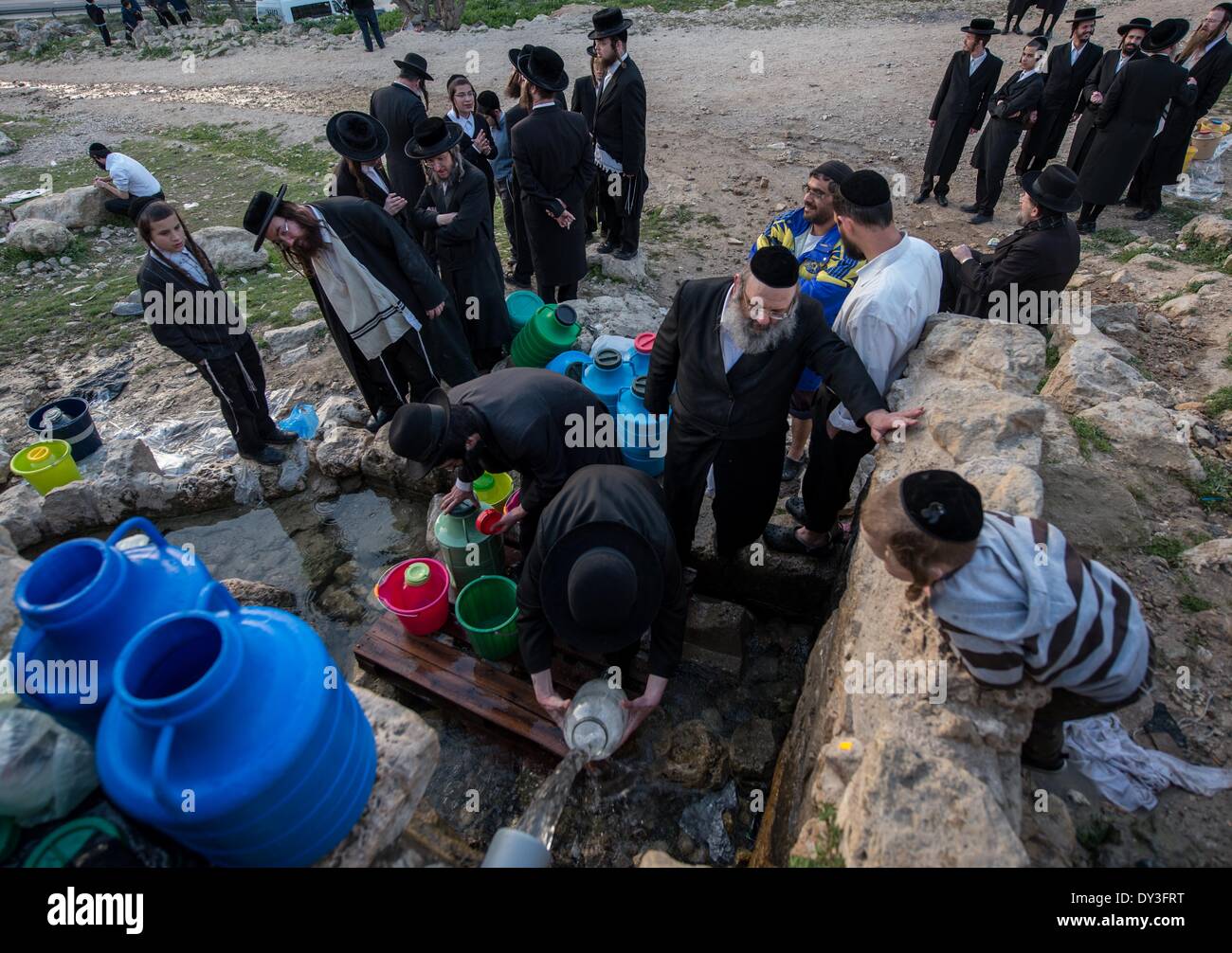 Jerusalem. 3rd Apr, 2014. Ultra-Orthodox Jews collect spring water ...