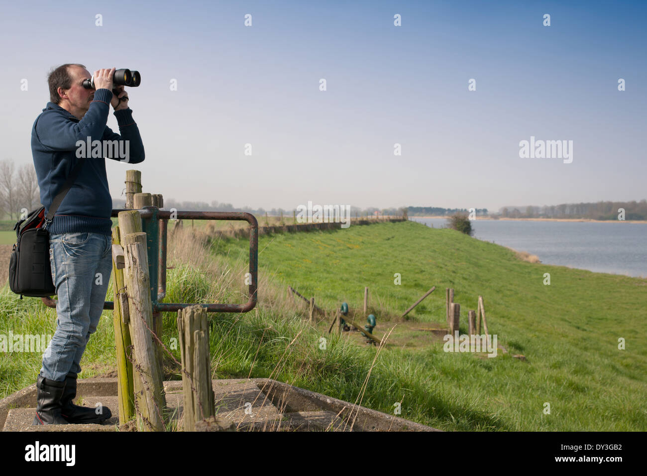 Dutch bird spotter is in a nature reserve Stock Photo - Alamy