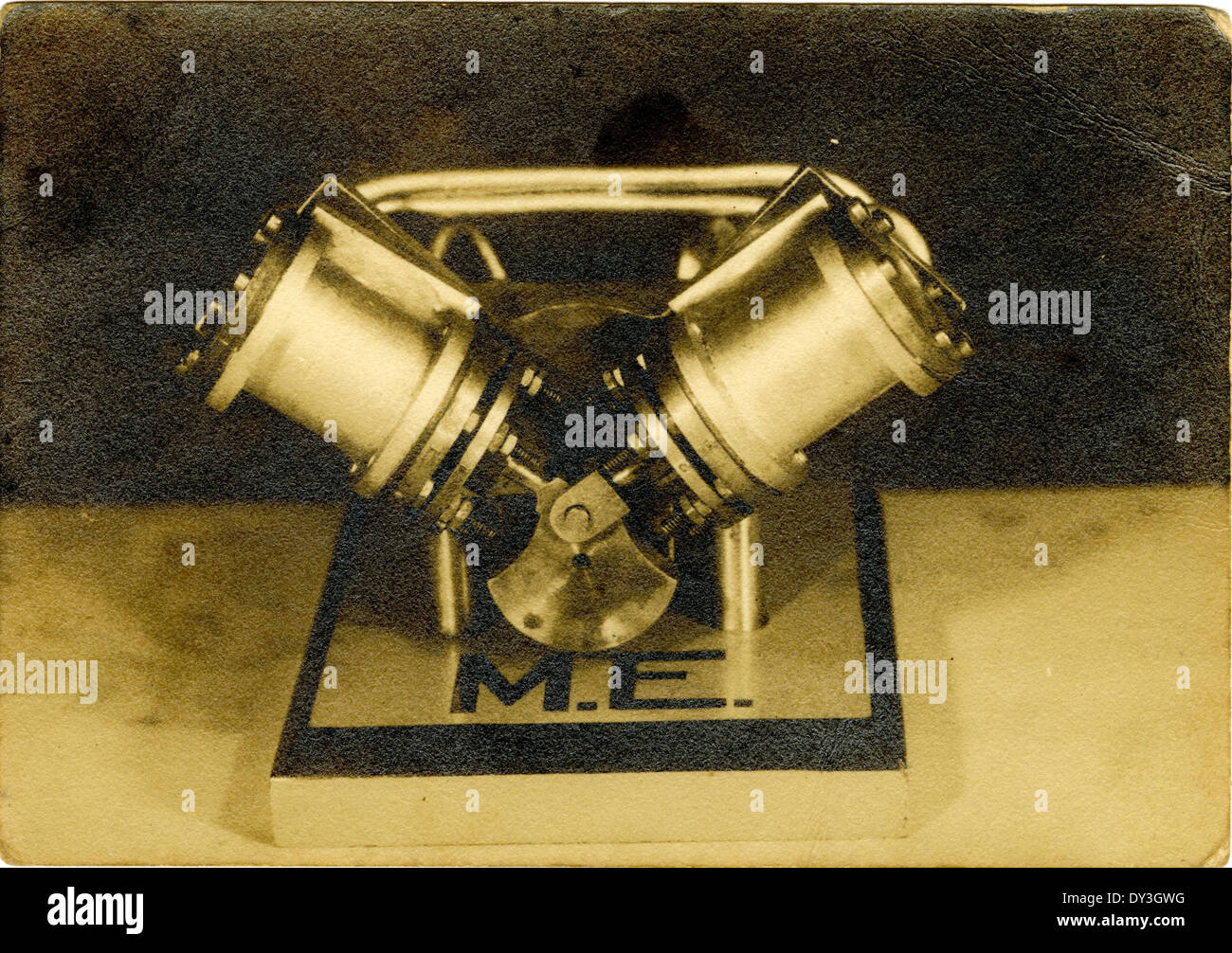 This image shows a metal mechanical compressor device, likely from the ...
