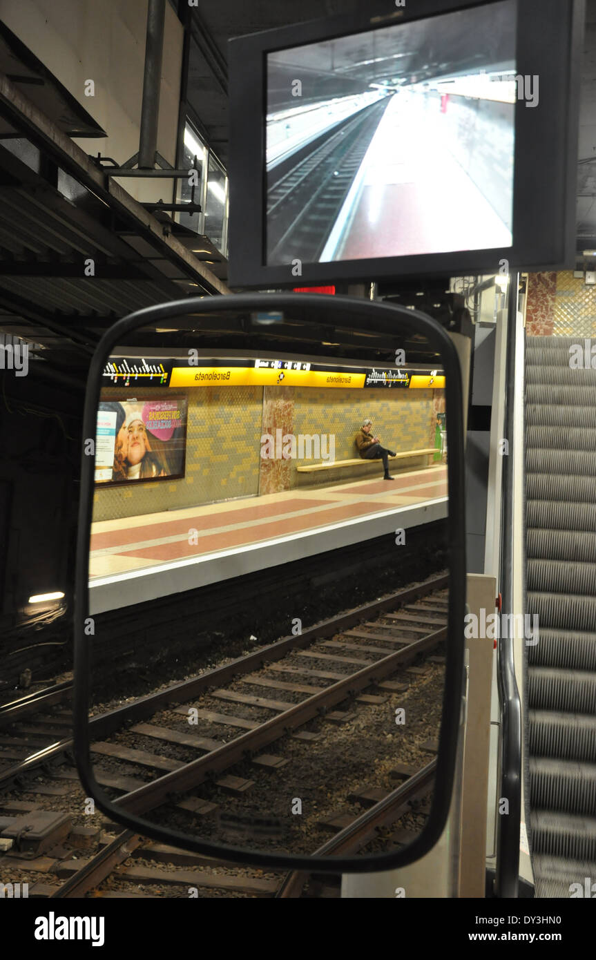 A mirror at the end of a platform in the Barcelona underground metro ...