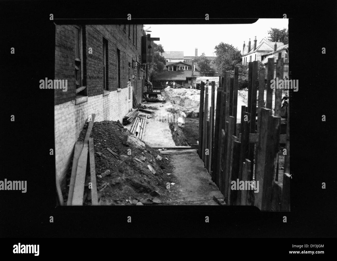 This photograph shows the process of loading and unloading rolls of ...