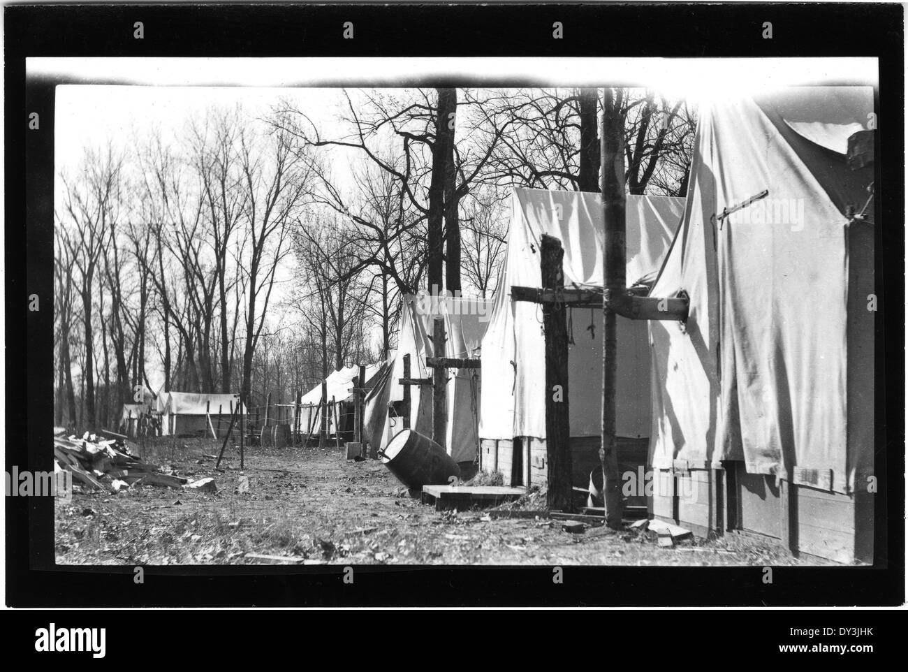 This image offers a view of a levee camp, capturing the infrastructure ...