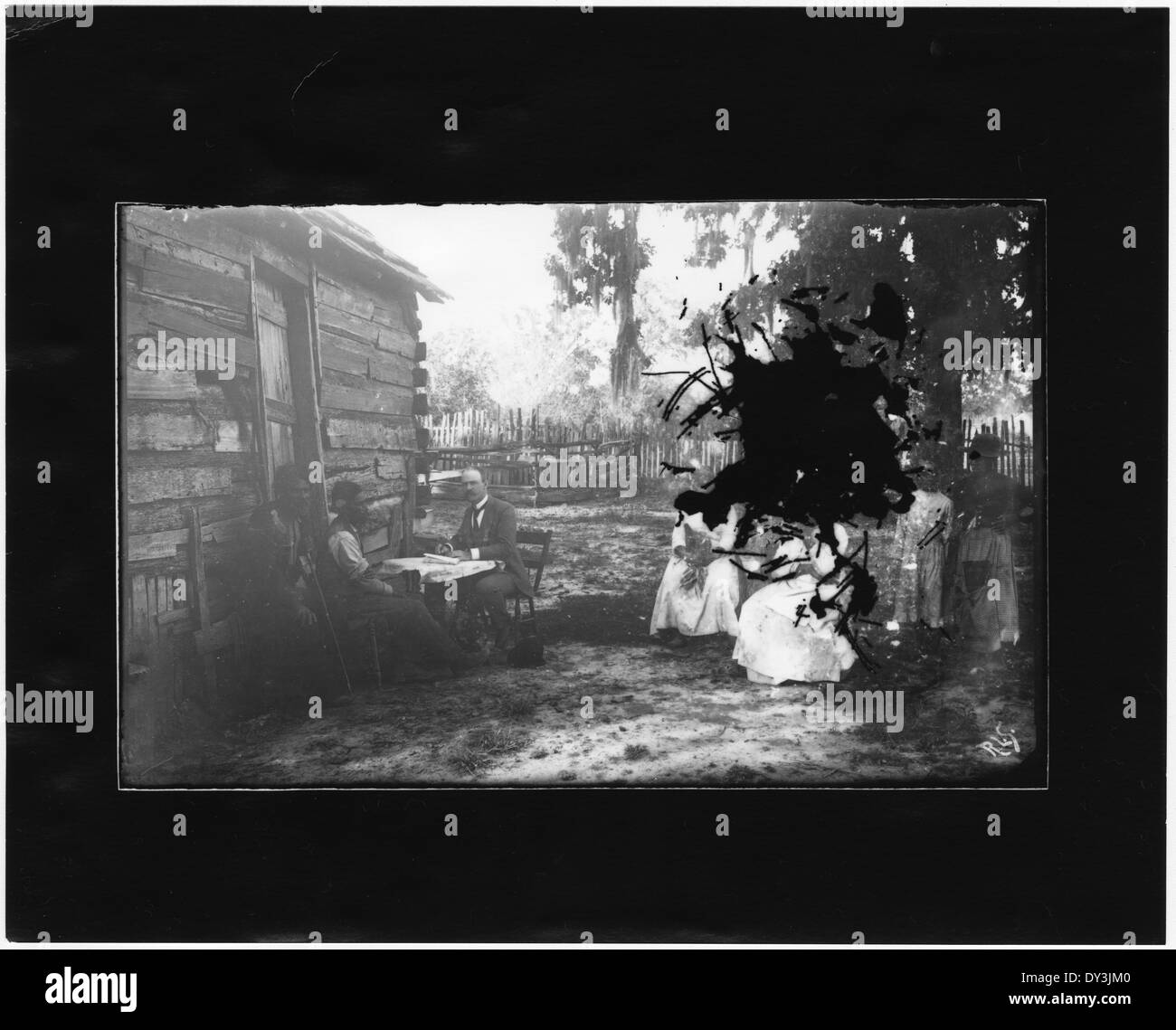 This image features a log cabin, offering a glimpse into early ...