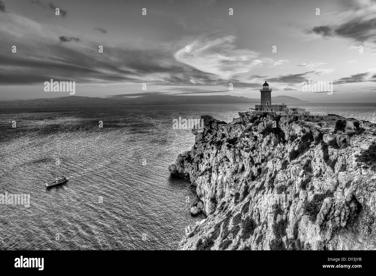 Stone in sea sunset Black and White Stock Photos & Images - Alamy