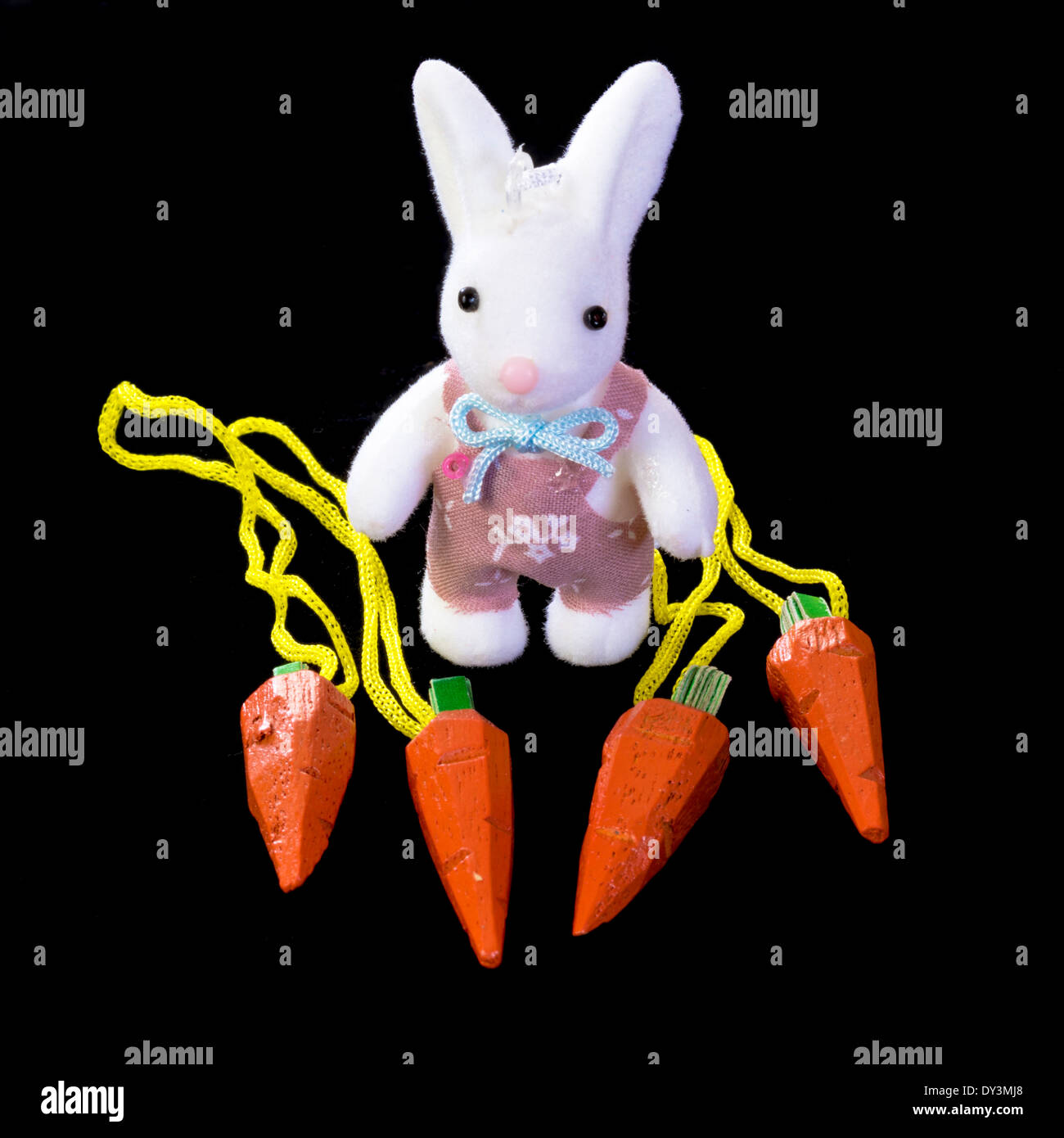 Toy bunny and carrots Stock Photo - Alamy