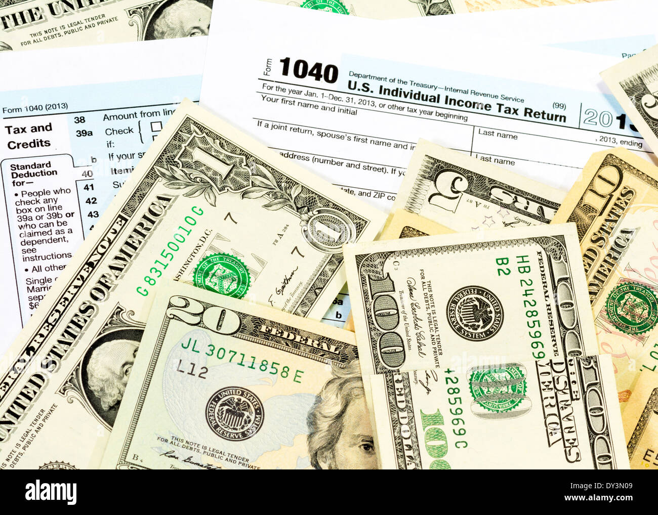 Money and federal tax forms Stock Photo - Alamy