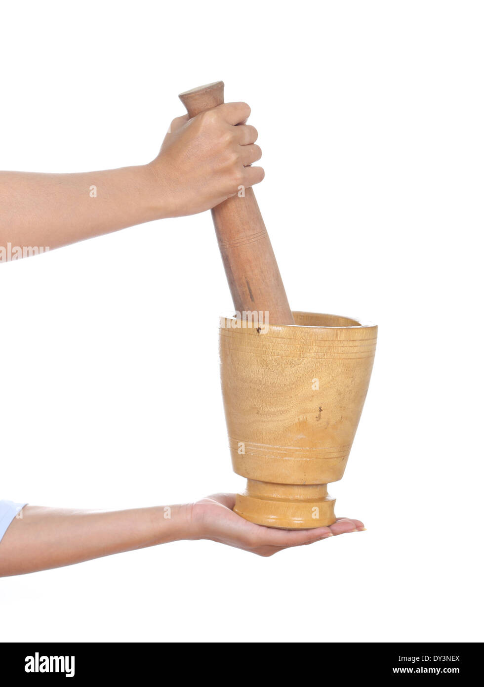 hand with mortar and pestle isolated on white background Stock Photo ...