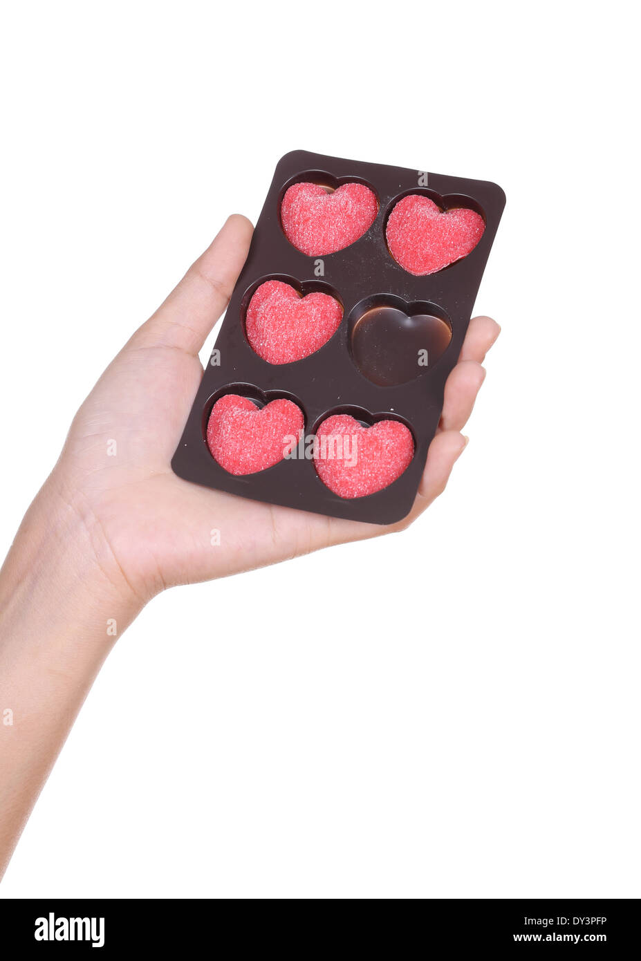 hands holding heart candy isolated on white background Stock Photo - Alamy