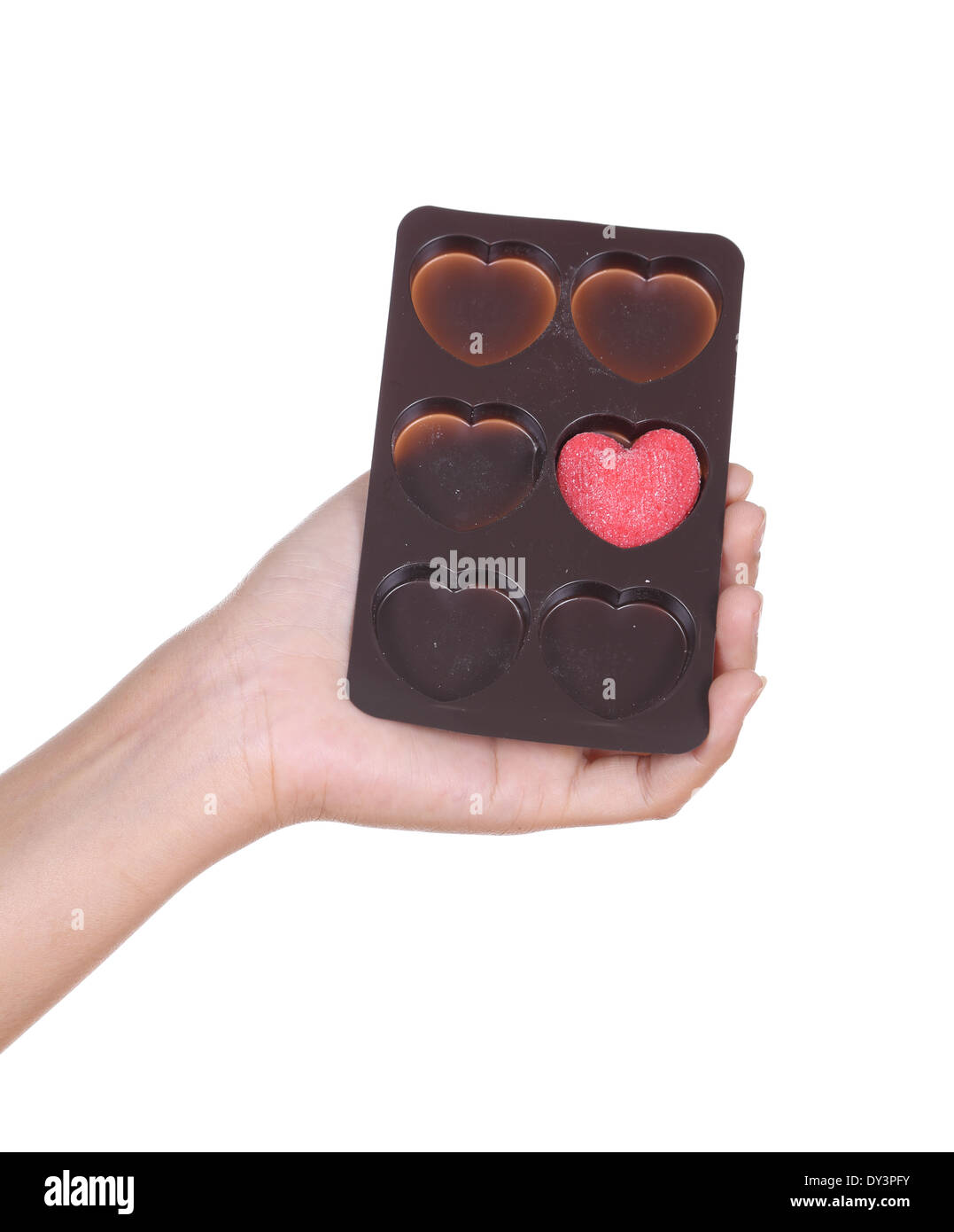 hands holding heart candy isolated on white background Stock Photo - Alamy