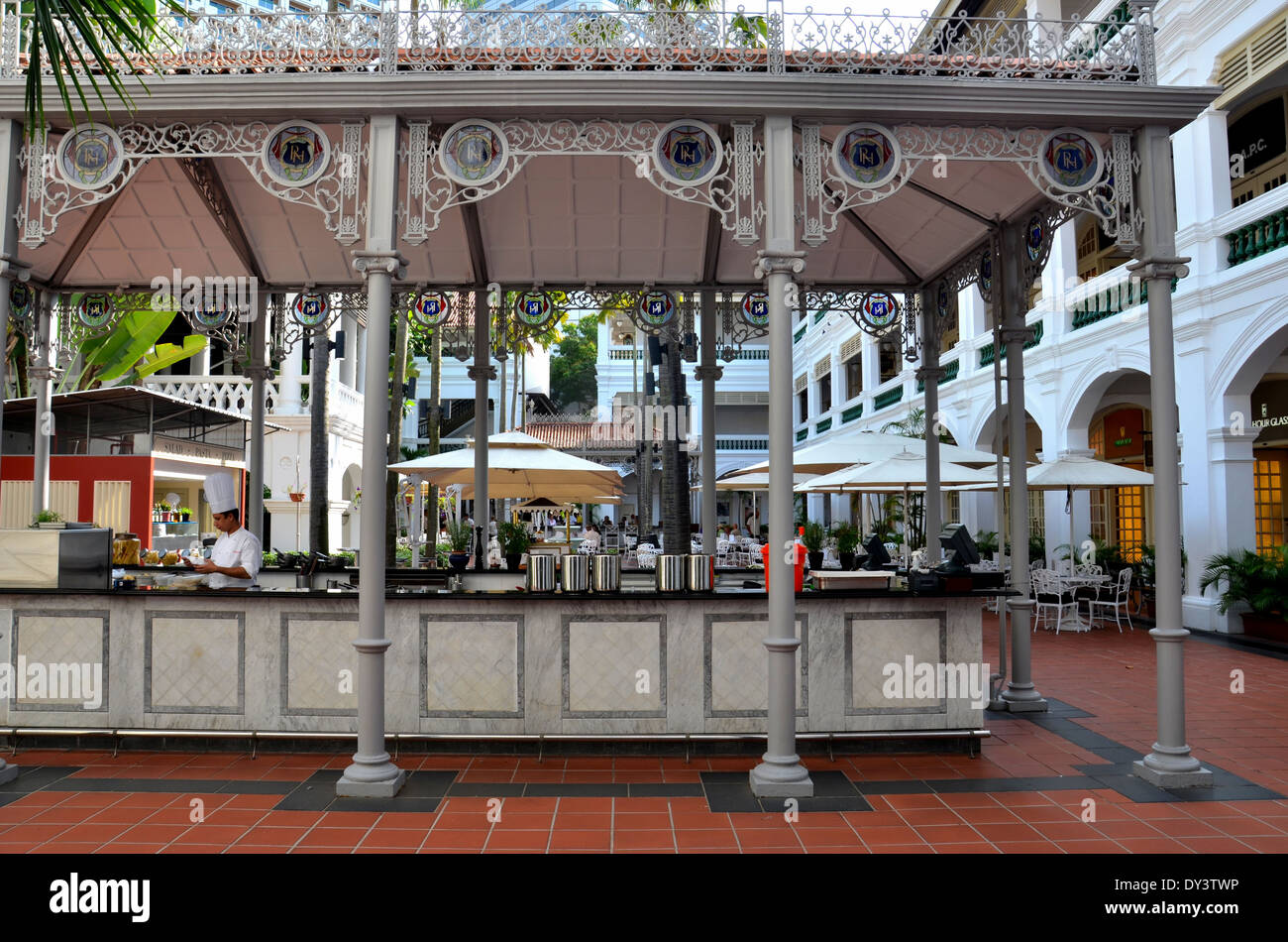 Raffles Hotel Courtyard bar and restaurant with logo and chef Singapore ...