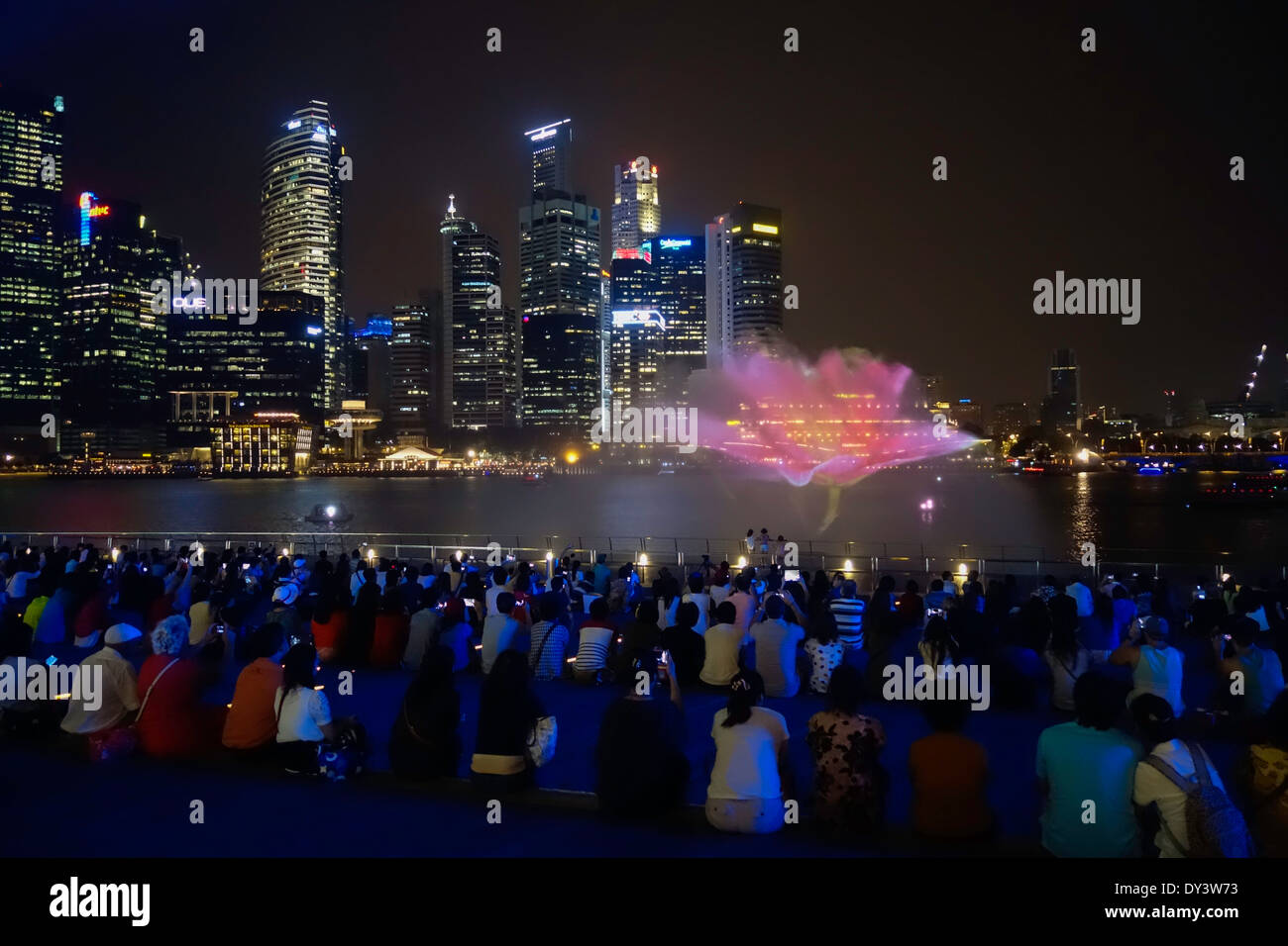 Light and water show at Marina Bay Sands at night, Singapore Stock ...