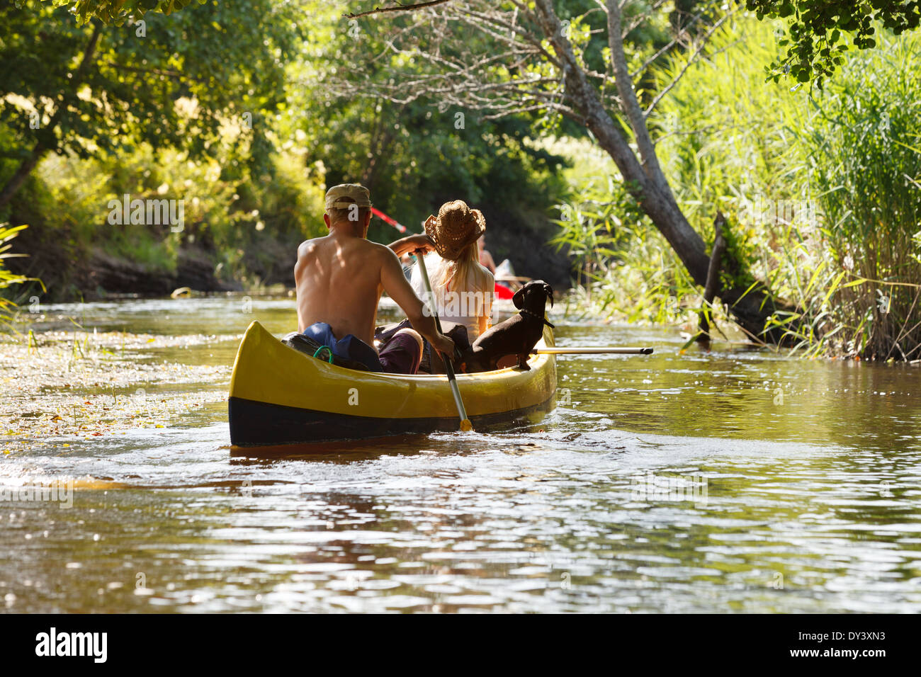 People boating on small river and having fun Stock Photo - Alamy