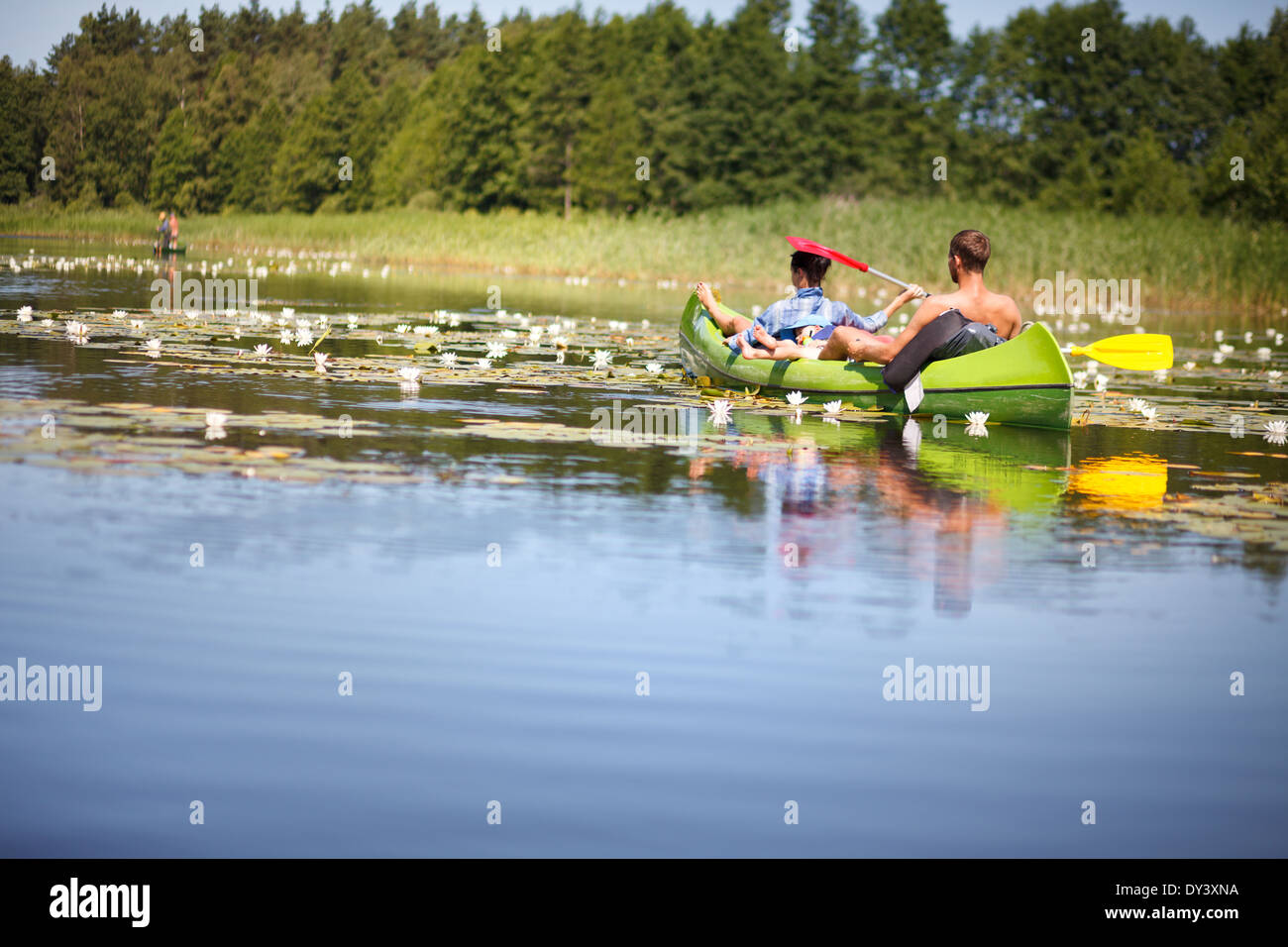 People boating on small river and having fun Stock Photo - Alamy