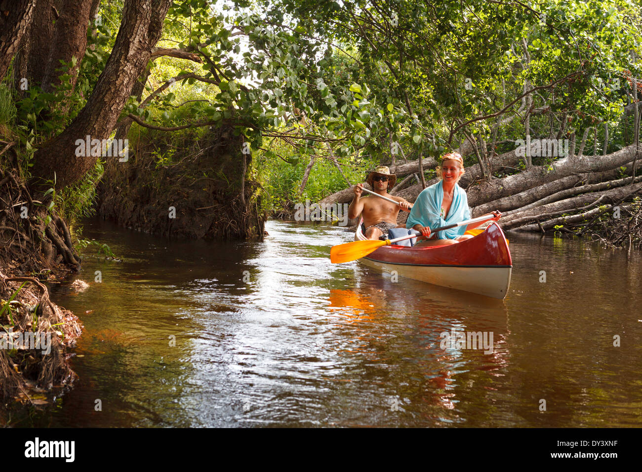 People boating on small river and having fun Stock Photo - Alamy