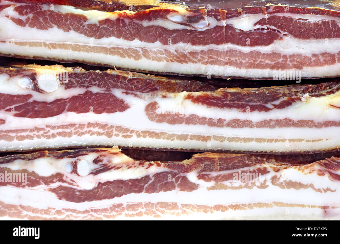 Three Dried Pork Bacon Stacked Stock Photo - Alamy