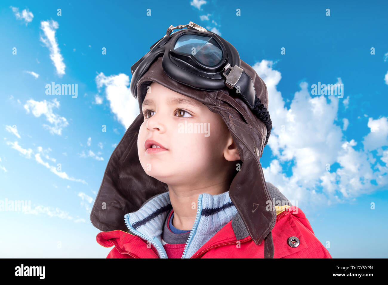 Young boy pilot isolated against the sky Stock Photo - Alamy
