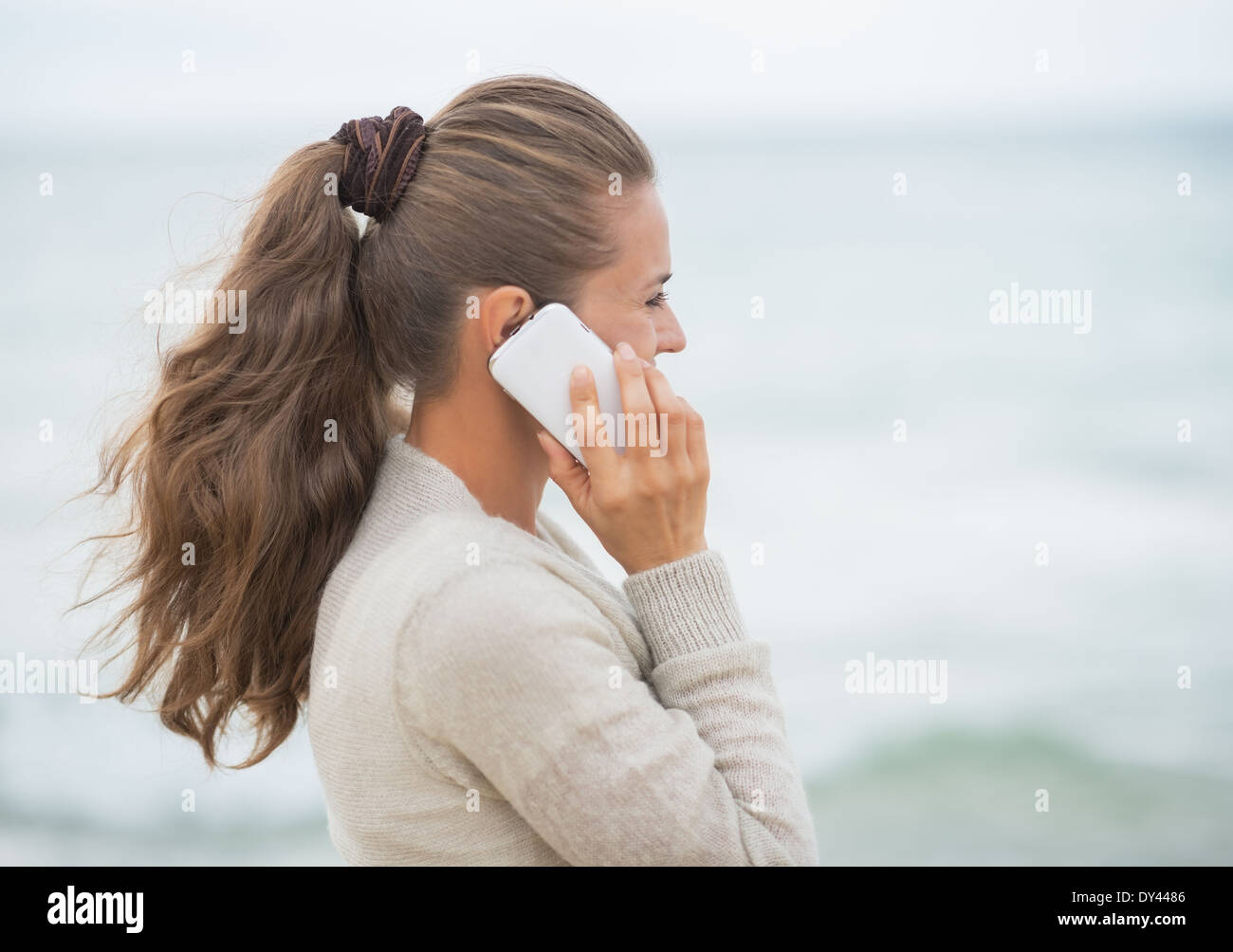 Talking speaking at the beach hi-res stock photography and images - Alamy