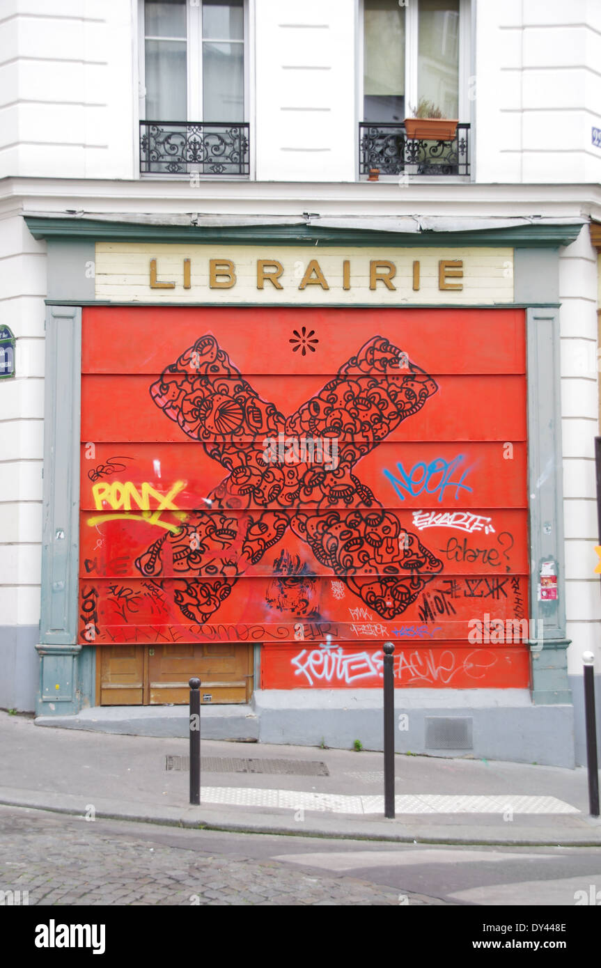 Librarie library covered in graffiti in Belleville, Paris Stock Photo ...
