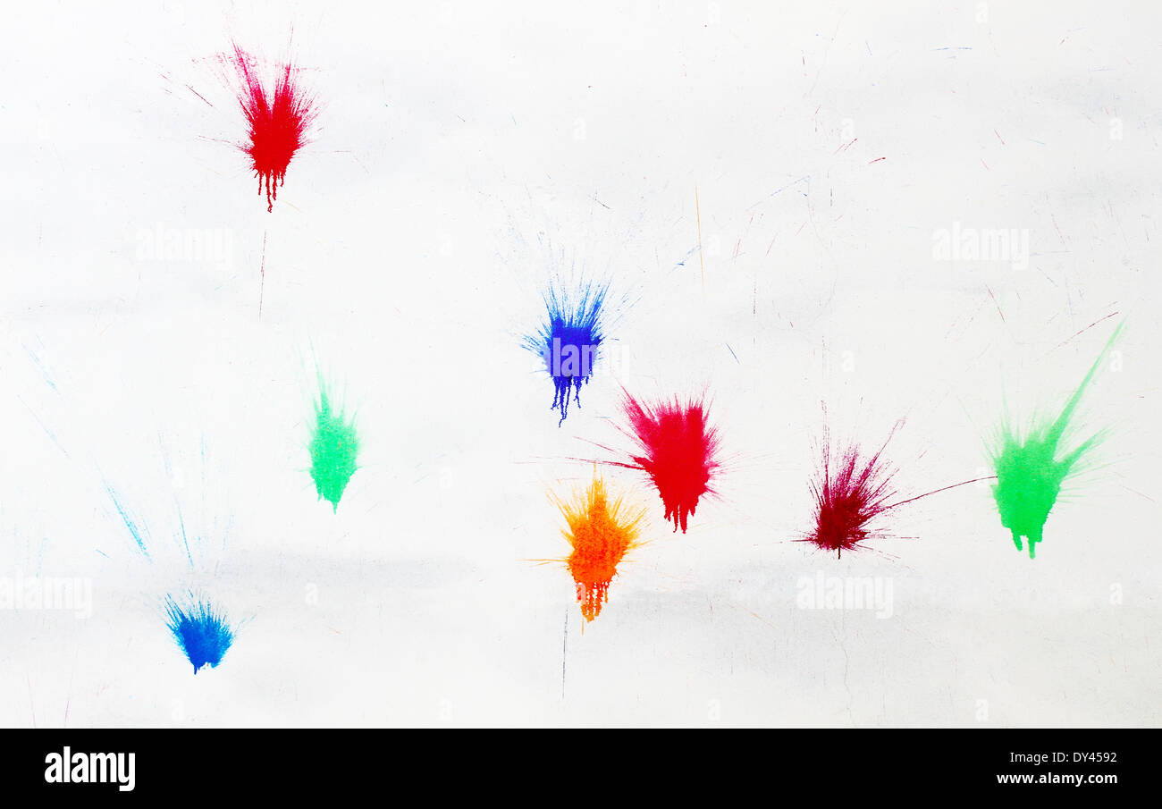 Background of a colors paint splatter on a white wall Stock Photo - Alamy