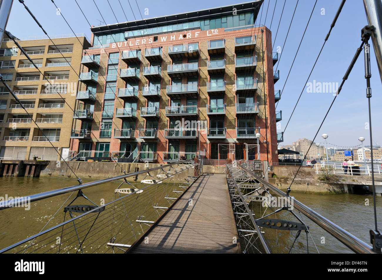 Small and narrow steel bridge leading to newly converted apartments at ...