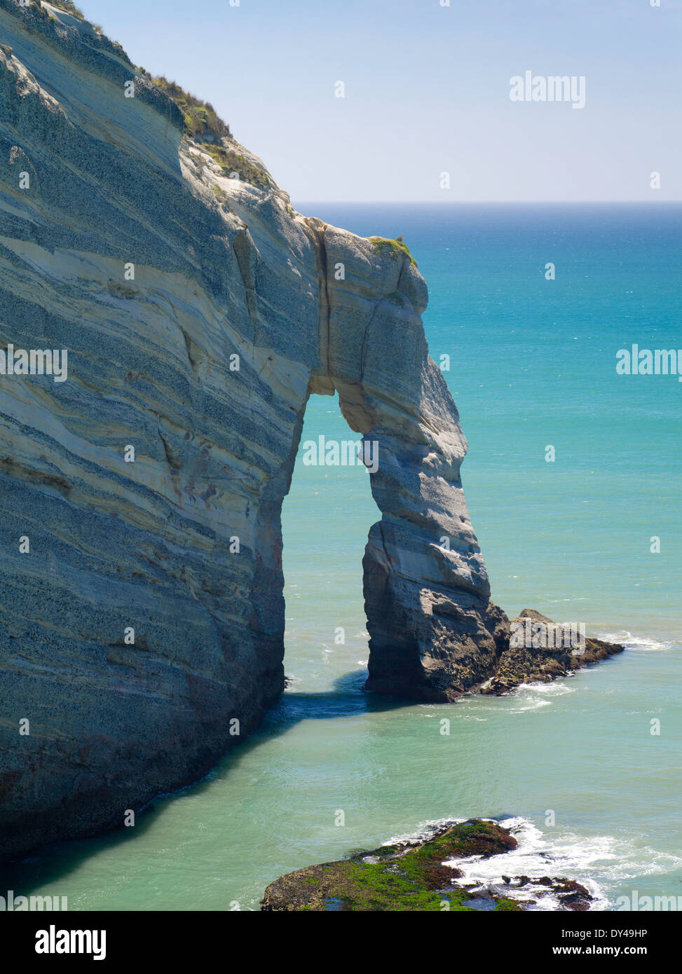 Arch at Cape Farewell, the northernmost point of the New Zealand's ...