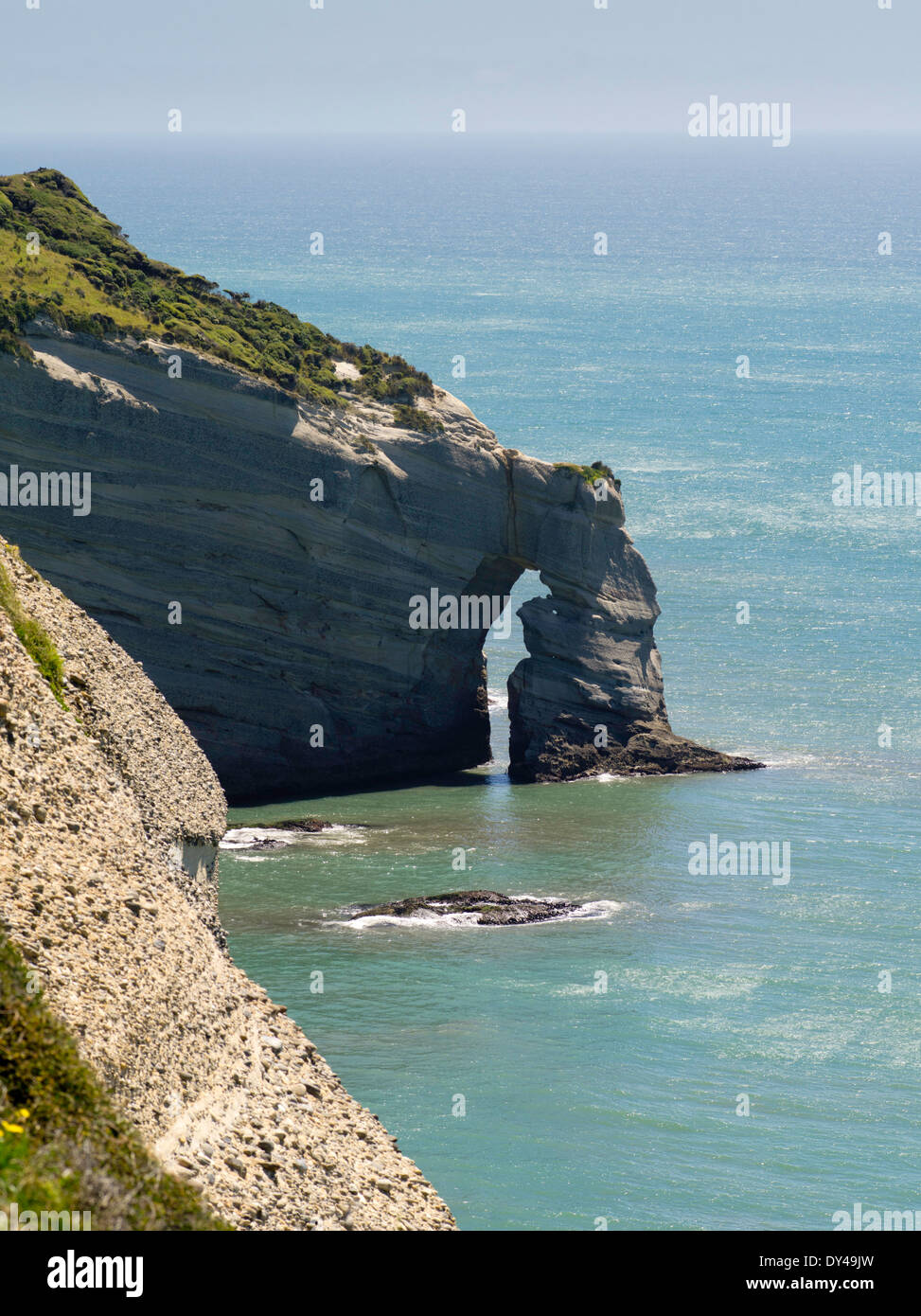 Arch at Cape Farewell, the northernmost point of the New Zealand's ...