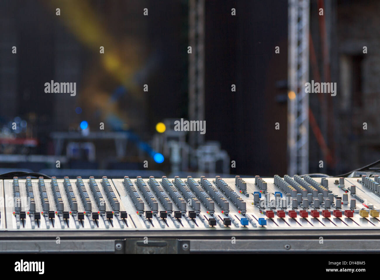 A mixing console in front of a stage Stock Photo - Alamy