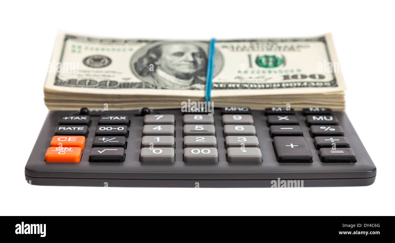Calculator and money on the white background Stock Photo - Alamy