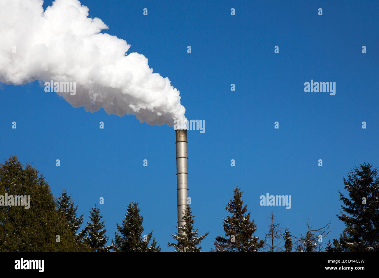 Paper mill billowing out smoke Stock Photo - Alamy