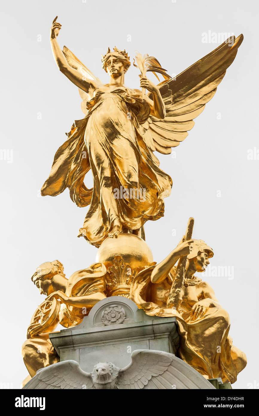 The golden angel with two seated figures on top of the Victoria ...
