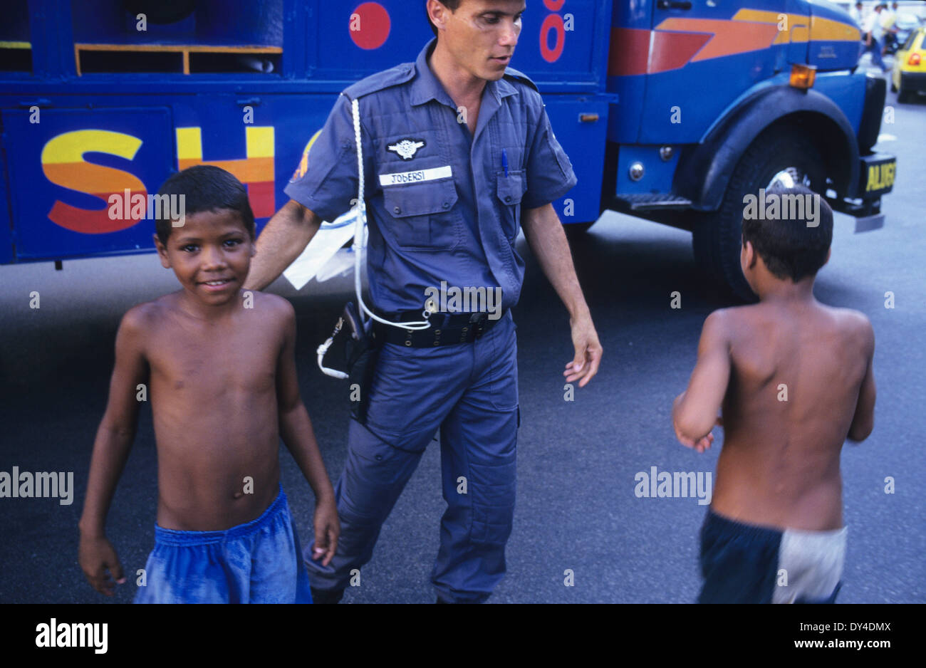 Street children playing in the street on truck, Rio de Janeiro city ...