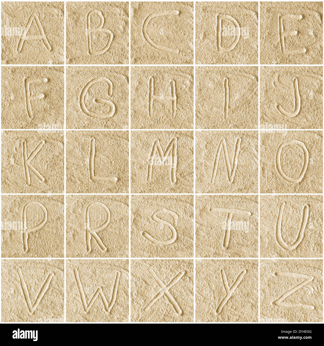 Alphabet writing on sand letter hi-res stock photography and images - Alamy