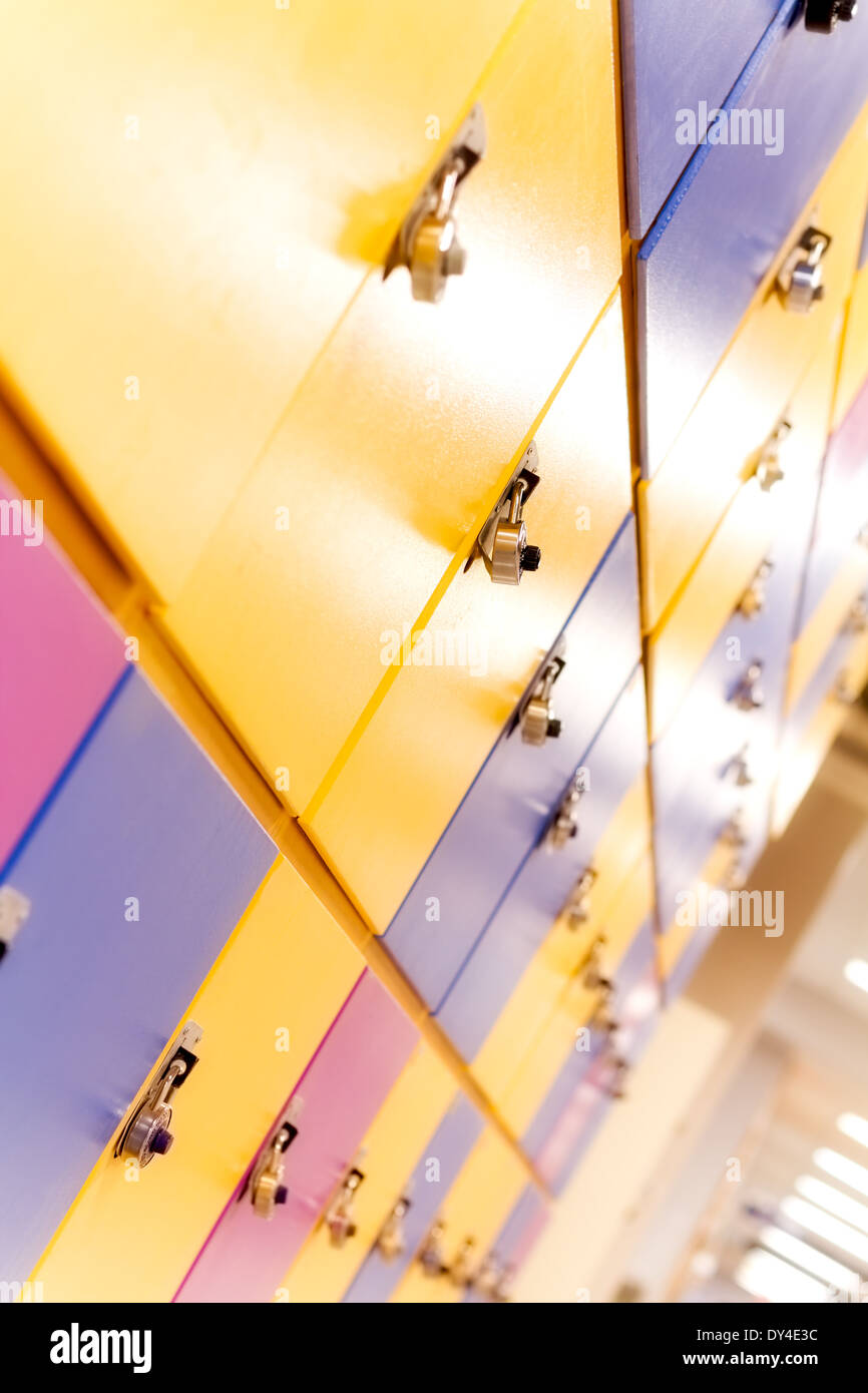 Colourful school lockers in yellow, blue and purple Stock Photo - Alamy