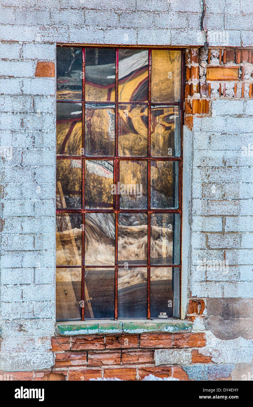 Reflections in an old window Stock Photo - Alamy