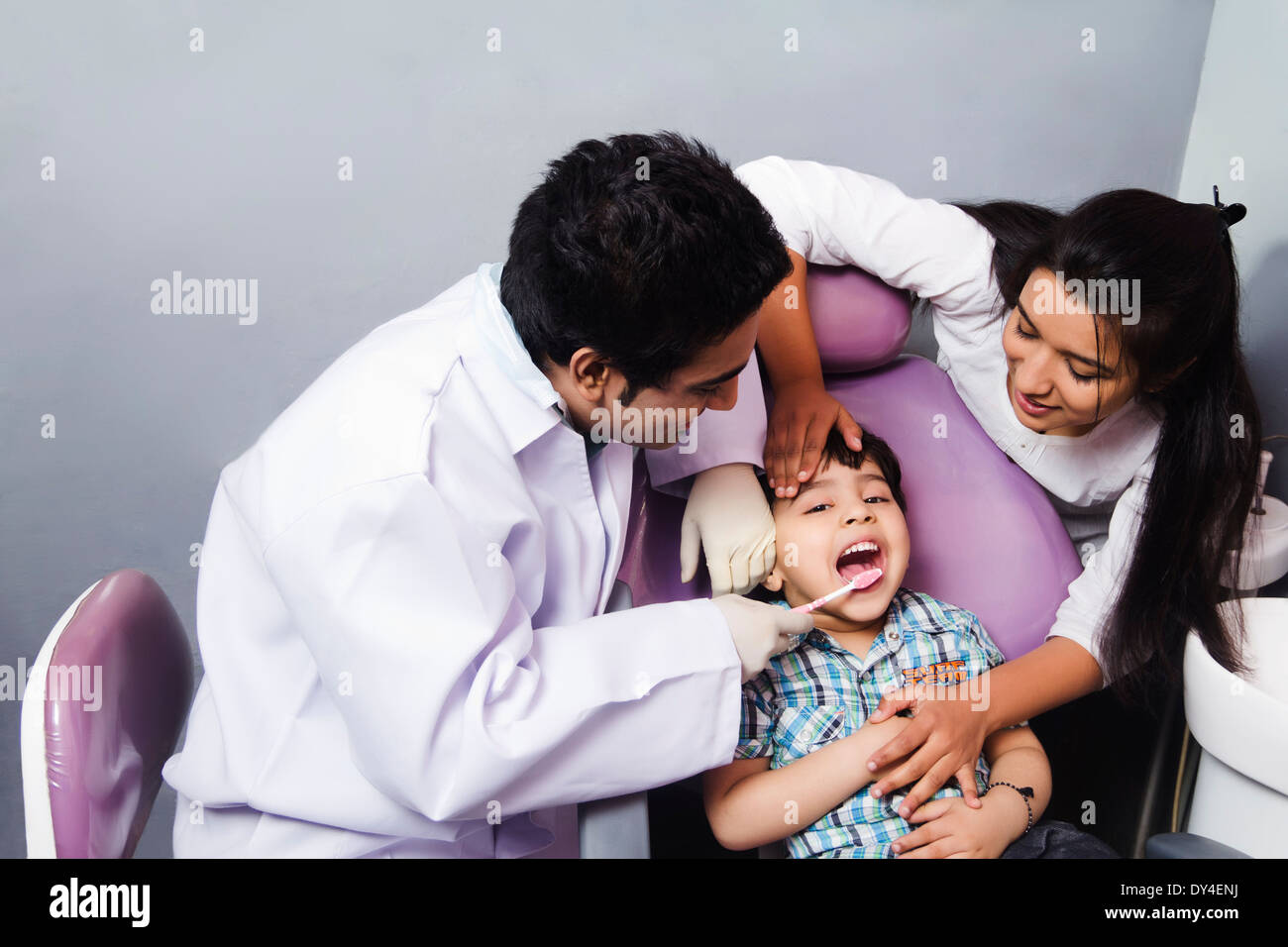 Indian Dentist Checking Teeth Stock Photo - Alamy