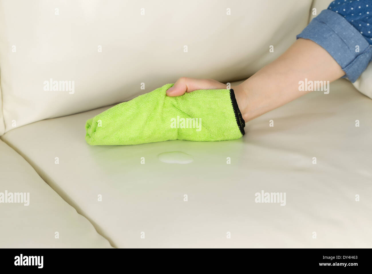 Horizontal photo of female hand holding microfiber rag with cleaning ...