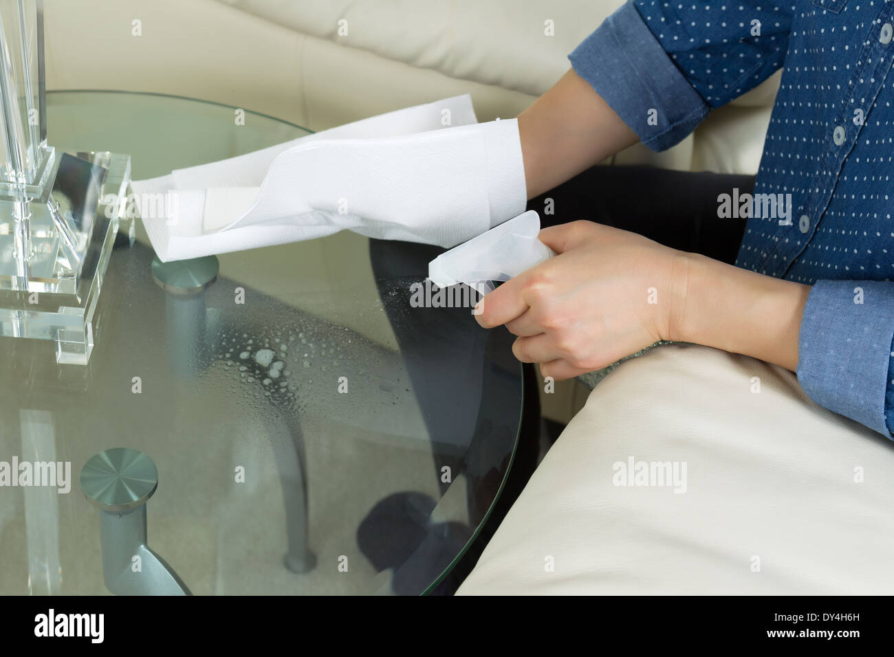 Horizontal photo female hand spraying cleaning solution, from spray ...