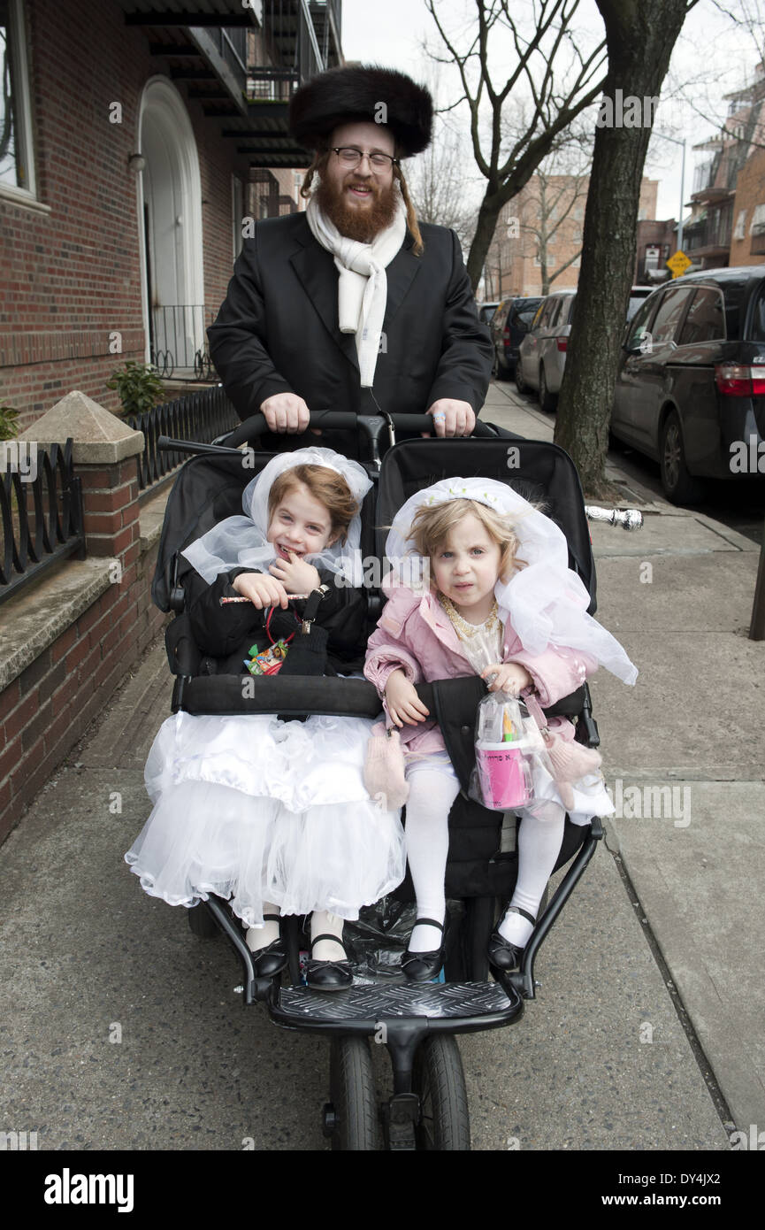 Religious Jews celebrate the holiday of Purim in the Borough Park ...