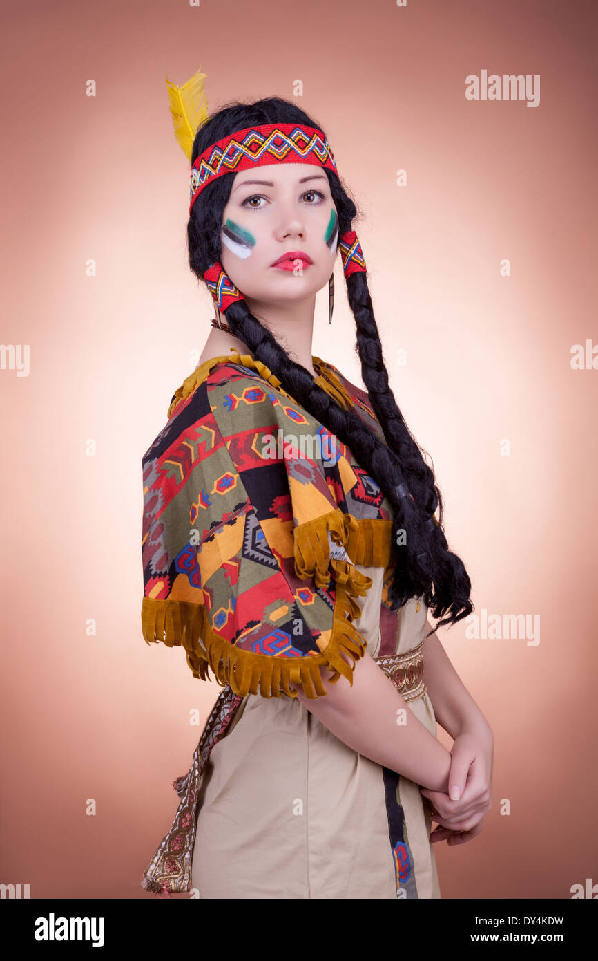 Native american girl on brown background. Studio shooting. Professional ...