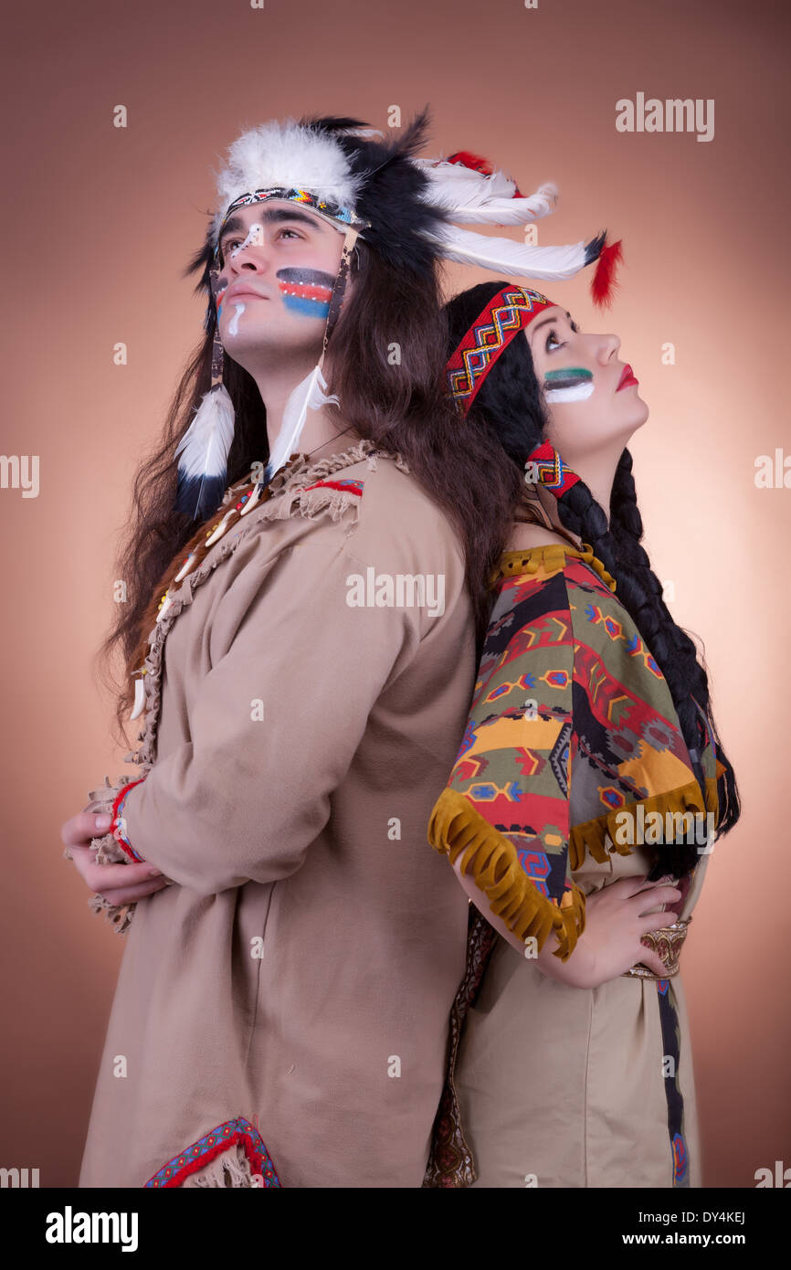 Native american couple on brown background. Studio shooting Stock Photo ...